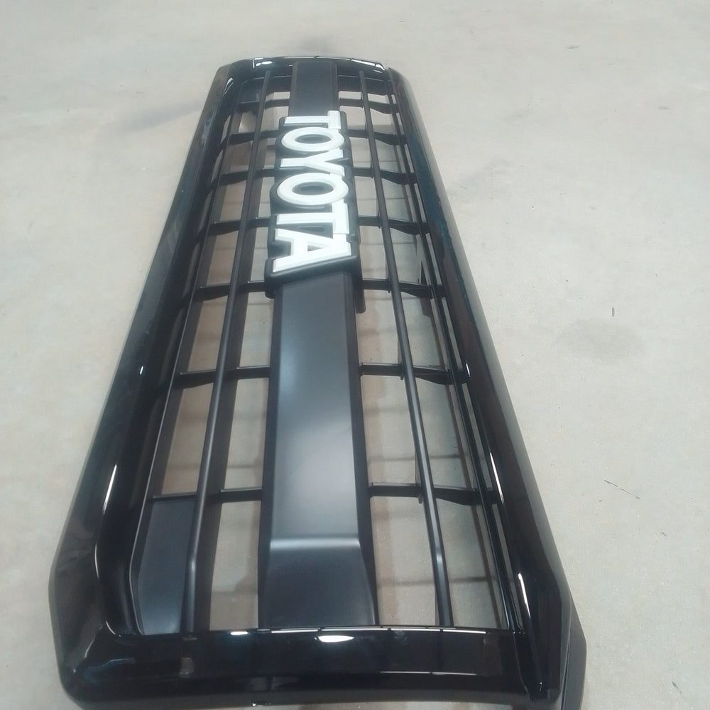 Land Cruiser 76/79 Series 70th Anniversary black grill. - the4x4store.co.za